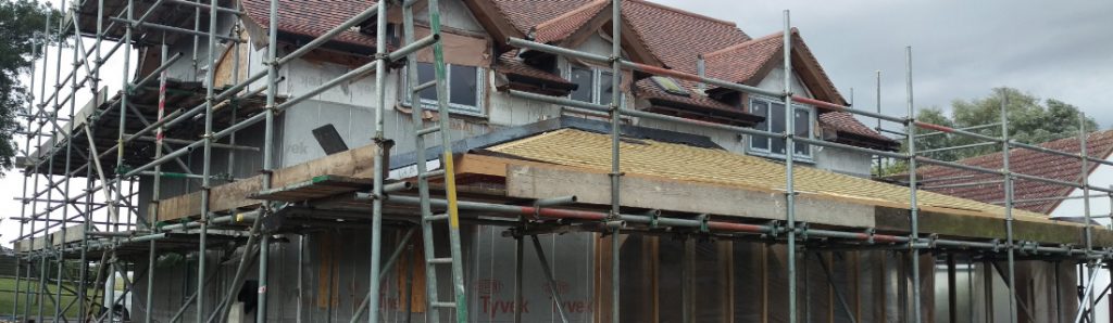 Textured Render Installed on New Build Family Home - Cornerstone